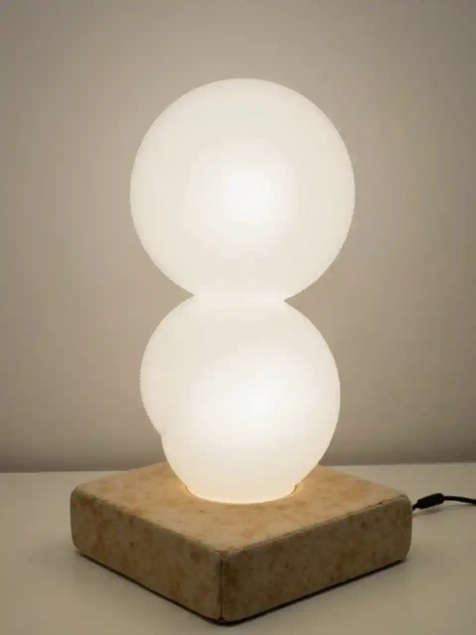 Elegant Table Lamp with Abstract Design and Soft Lighting