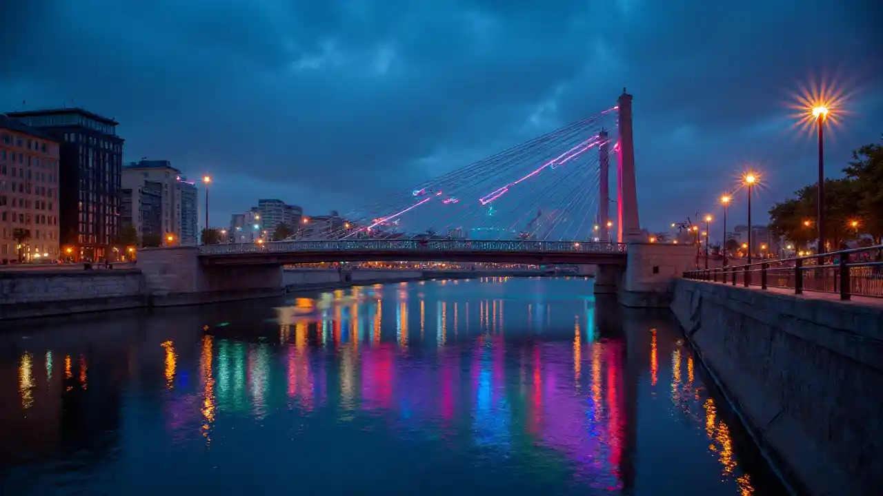 Double Lane Bridge with LED Lights Over a River in the City