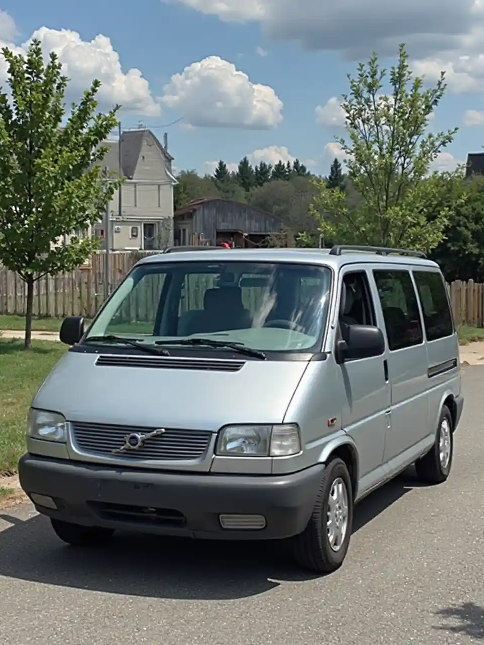 Exploring the Exterior Features of a 1998 Silver Volvo Minivan